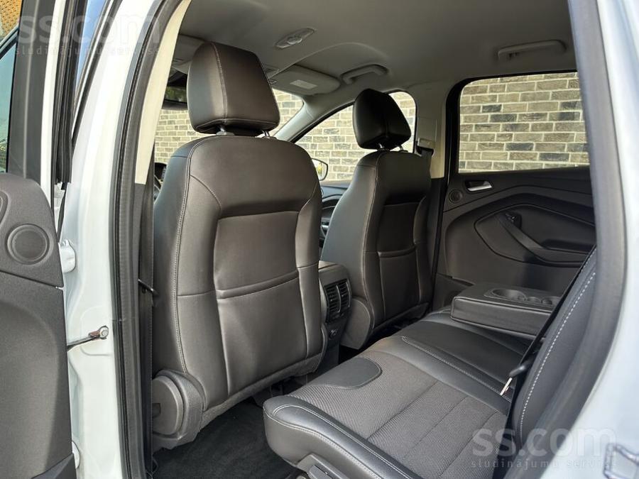 White Ford Kuga 2014 in Tukums, with an engine capacity of 2.00 L and mileage of 151 thousand km for 8990 €, photo 16 on AUTOMOTO.COM.LV