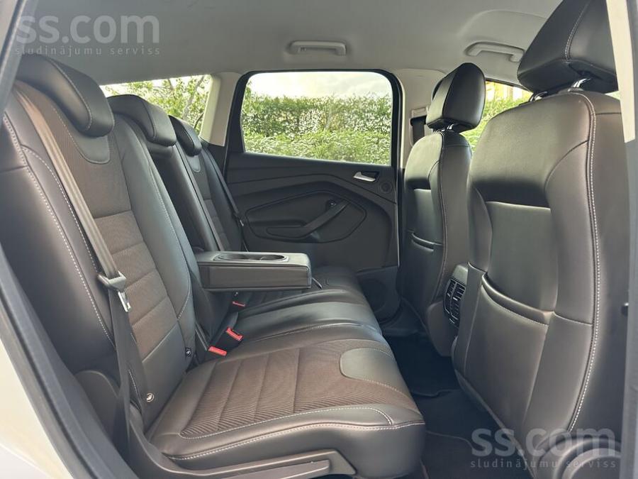 White Ford Kuga 2014 in Tukums, with an engine capacity of 2.00 L and mileage of 151 thousand km for 8990 €, photo 17 on AUTOMOTO.COM.LV