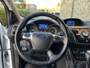 White Ford Kuga 2014 in Tukums, with an engine capacity of 2.00 L and mileage of 151 thousand km for 8990 €, photo 19 on AUTOMOTO.COM.LV