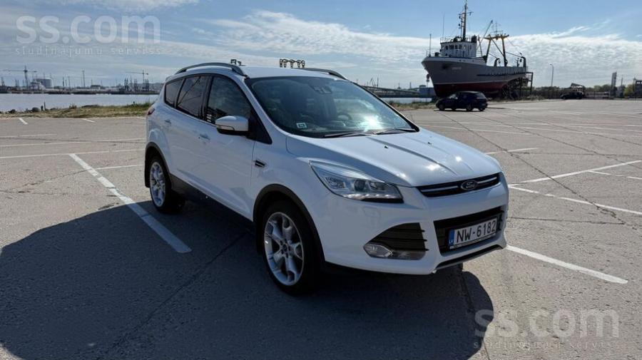 White Ford Kuga 2014 in Kuldiga, with an engine capacity of 2.00 L and mileage of 200 thousand km for 10500 €, photo 3 on AUTOMOTO.COM.LV