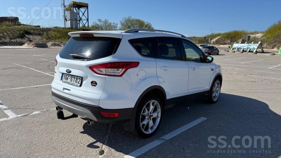 White Ford Kuga 2014 in Kuldiga, with an engine capacity of 2.00 L and mileage of 200 thousand km for 10500 €, photo 4 on AUTOMOTO.COM.LV