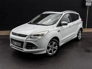 White Ford Kuga 2014 in Jelgava, with an engine capacity of 2.20 L and mileage of 240 thousand km for 7995 €, photo 4 on AUTOMOTO.COM.LV