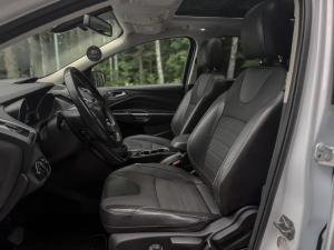 White Ford Kuga 2014 in Jelgava, with an engine capacity of 2.20 L and mileage of 240 thousand km for 7995 €, photo 11 on AUTOMOTO.COM.LV