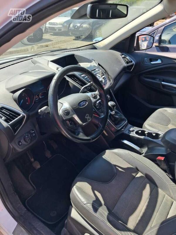 White Ford Kuga 2014 in Raseiniai, with an engine capacity of 2.00 L and mileage of 209 thousand km for 7950 €, photo 4 on AUTOMOTO.COM.LV