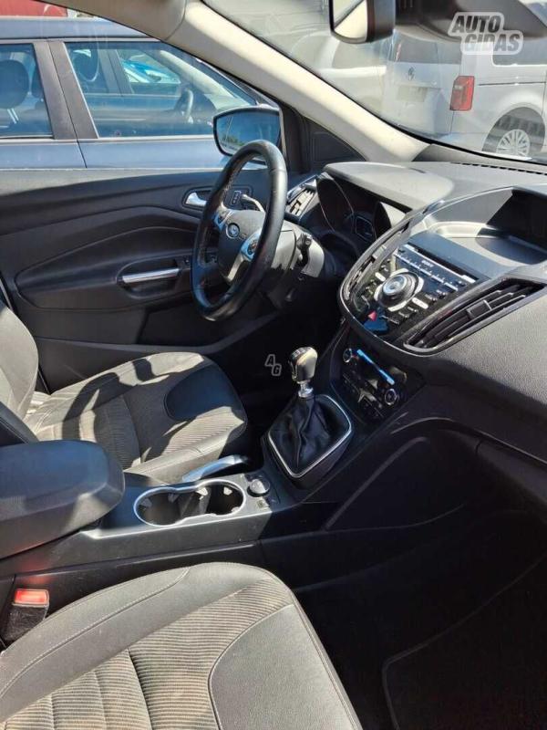 White Ford Kuga 2014 in Raseiniai, with an engine capacity of 2.00 L and mileage of 209 thousand km for 7950 €, photo 6 on AUTOMOTO.COM.LV