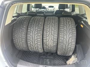 White Ford Kuga 2014 in Riga, with an engine capacity of 1.60 L and mileage of 280 thousand km for 5950 €, photo 8 on AUTOMOTO.COM.LV