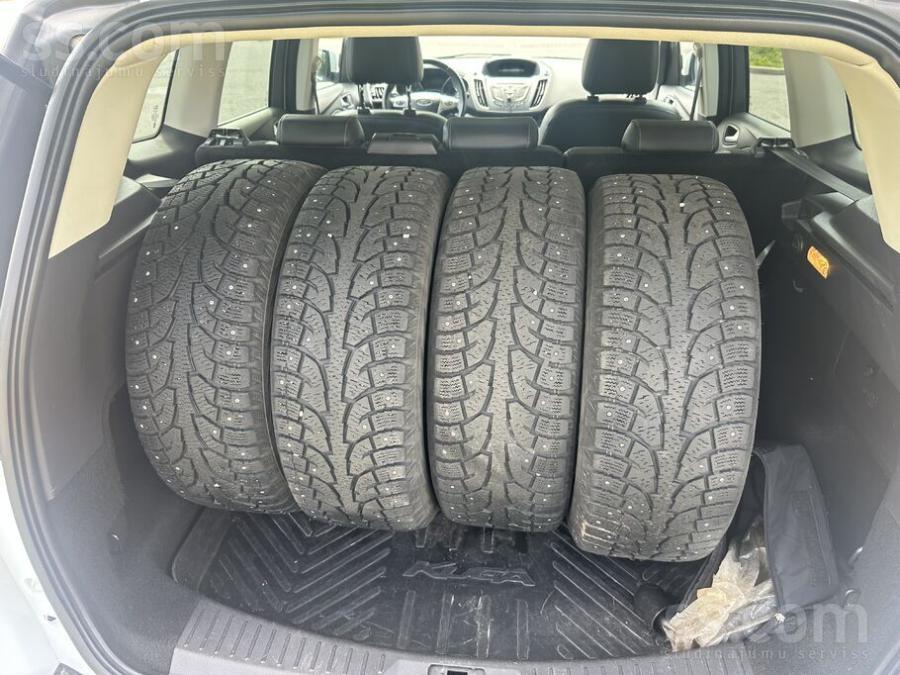White Ford Kuga 2014 in Riga, with an engine capacity of 1.60 L and mileage of 280 thousand km for 5950 €, photo 8 on AUTOMOTO.COM.LV