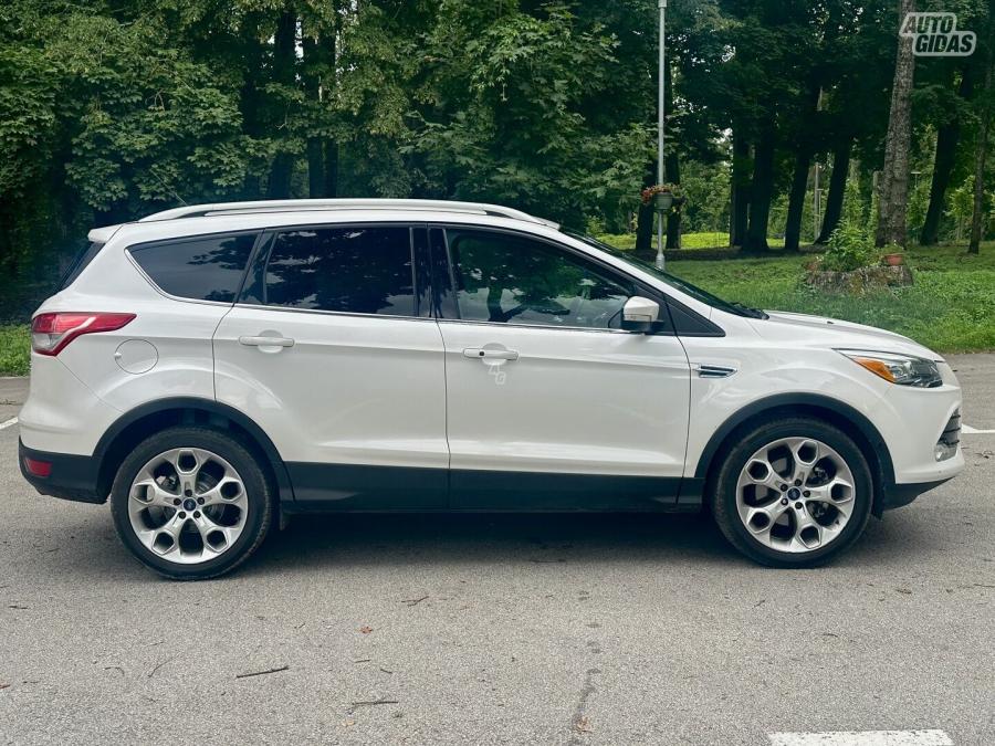 White Ford Kuga 2014 in Alytus, with an engine capacity of 2.00 L and mileage of 108 thousand km for 8300 €, photo 9 on AUTOMOTO.COM.LV