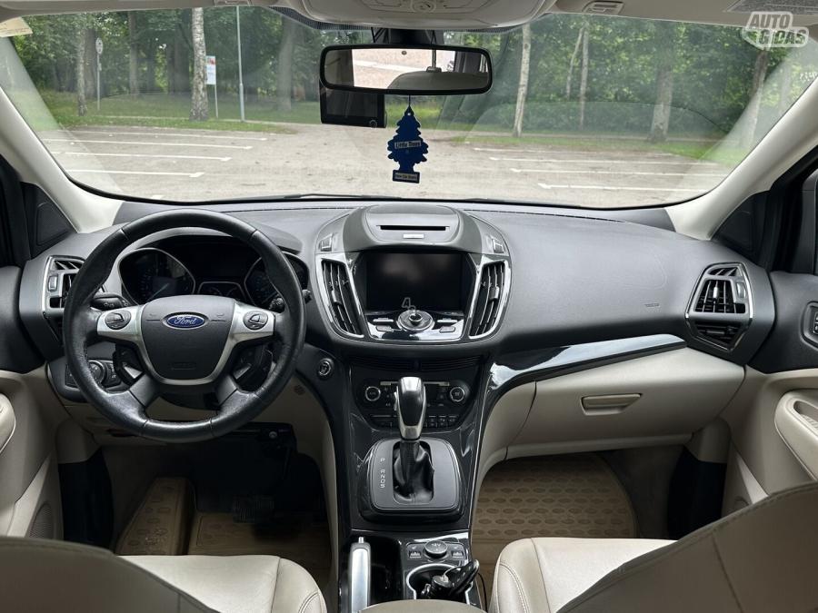 White Ford Kuga 2014 in Alytus, with an engine capacity of 2.00 L and mileage of 108 thousand km for 8300 €, photo 12 on AUTOMOTO.COM.LV