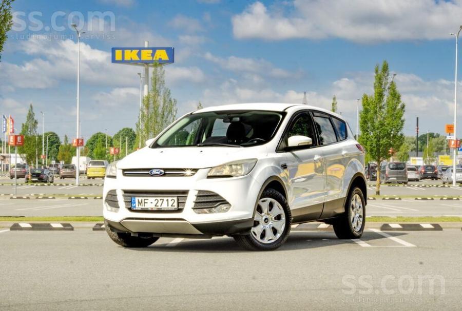 White Ford Kuga 2014 in Riga, with an engine capacity of 2.00 L and mileage of 254 thousand km for 7790 €, photo 1 on AUTOMOTO.COM.LV