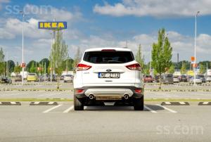 White Ford Kuga 2014 in Riga, with an engine capacity of 2.00 L and mileage of 254 thousand km for 7790 €, photo 7 on AUTOMOTO.COM.LV