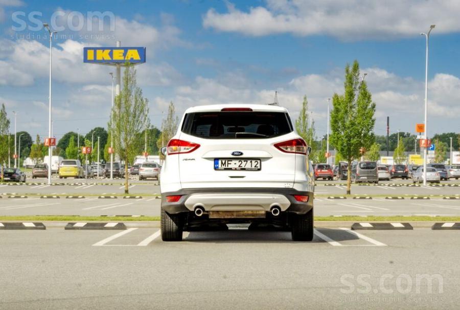 White Ford Kuga 2014 in Riga, with an engine capacity of 2.00 L and mileage of 254 thousand km for 7790 €, photo 7 on AUTOMOTO.COM.LV