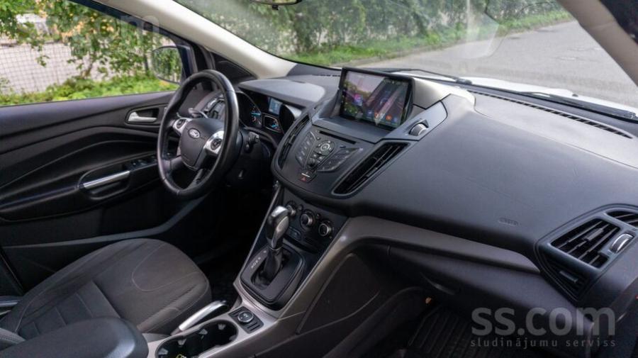 White Ford Kuga 2014 in Riga, with an engine capacity of 2.00 L and mileage of 254 thousand km for 7790 €, photo 11 on AUTOMOTO.COM.LV