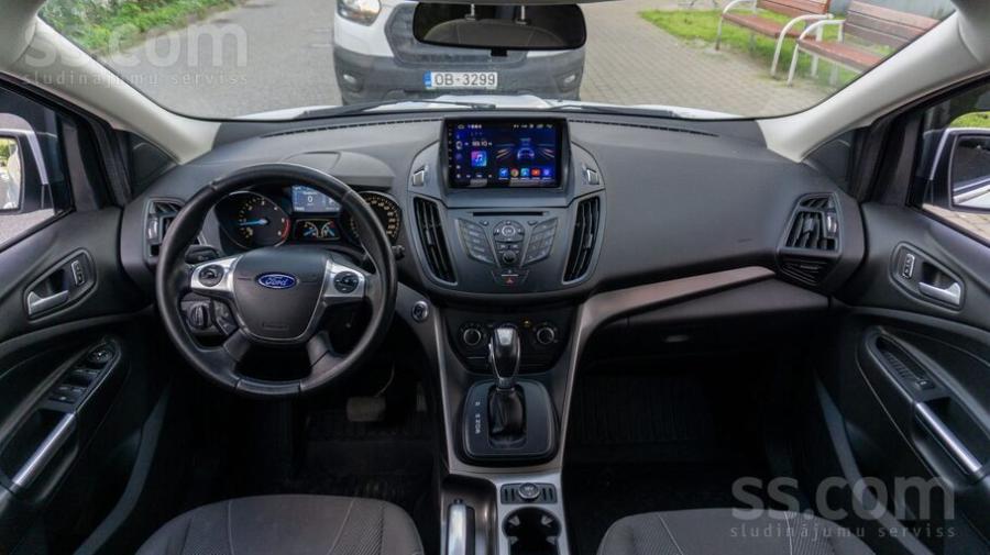 White Ford Kuga 2014 in Riga, with an engine capacity of 2.00 L and mileage of 254 thousand km for 7790 €, photo 12 on AUTOMOTO.COM.LV