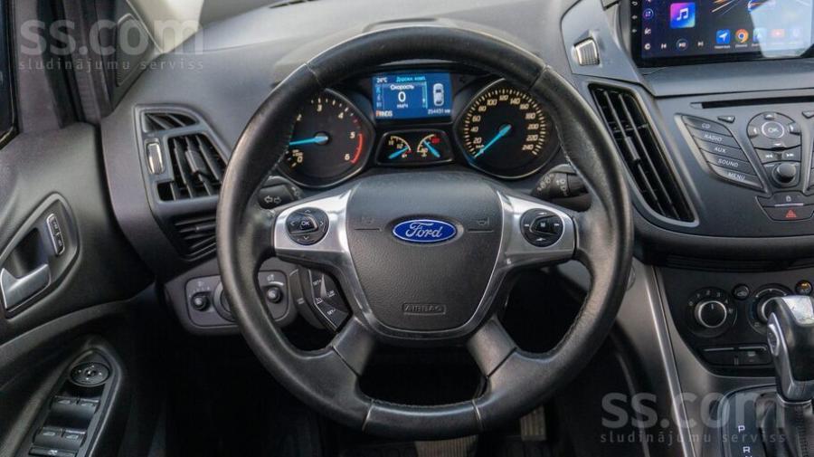 White Ford Kuga 2014 in Riga, with an engine capacity of 2.00 L and mileage of 254 thousand km for 7790 €, photo 14 on AUTOMOTO.COM.LV