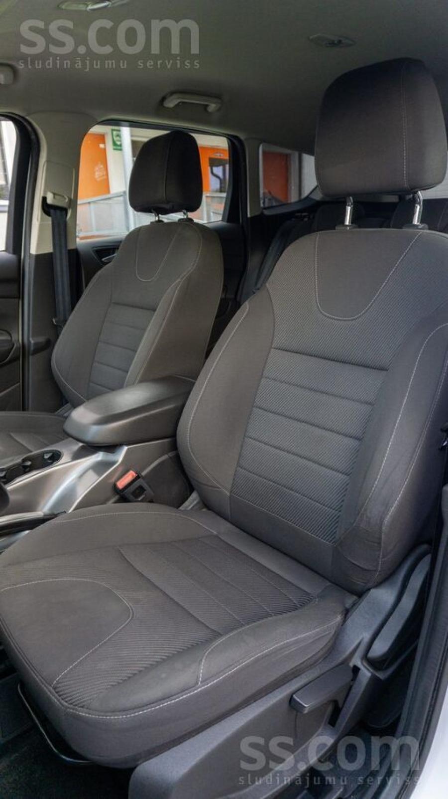 White Ford Kuga 2014 in Riga, with an engine capacity of 2.00 L and mileage of 254 thousand km for 7790 €, photo 23 on AUTOMOTO.COM.LV