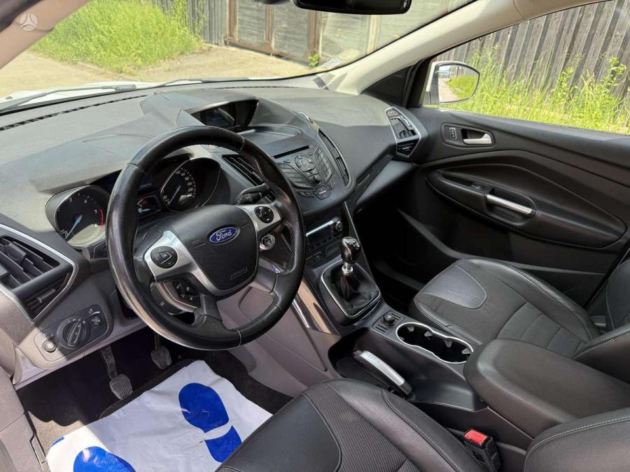 White Ford Kuga 2014 in Alytus, with an engine capacity of 2.00 L and mileage of 283 thousand km for 6500 €, photo 12 on AUTOMOTO.COM.LV