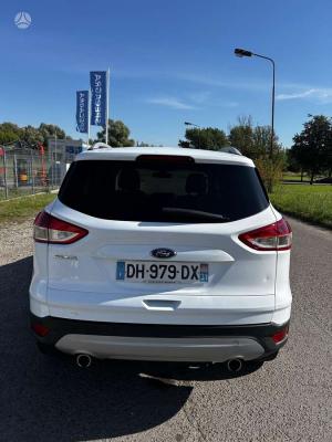 White Ford Kuga 2014 in Panevezys, with an engine capacity of 2.00 L and mileage of 199 thousand km for 6550 €, photo 5 on AUTOMOTO.COM.LV