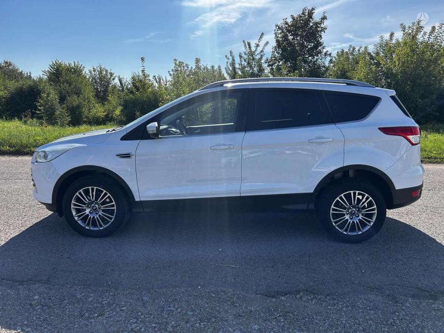 White Ford Kuga 2014 in Panevezys, with an engine capacity of 2.00 L and mileage of 199 thousand km for 6550 €, photo 6 on AUTOMOTO.COM.LV