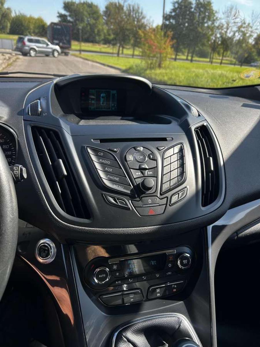 White Ford Kuga 2014 in Panevezys, with an engine capacity of 2.00 L and mileage of 199 thousand km for 6550 €, photo 14 on AUTOMOTO.COM.LV