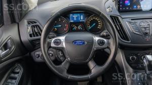 White Ford Kuga 2014 in Riga, with an engine capacity of 2.00 L and mileage of 254 thousand km for 6790 €, photo 14 on AUTOMOTO.COM.LV