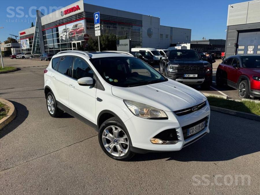 White Ford Kuga 2014 in Riga, with an engine capacity of 2.00 L and mileage of 206 thousand km for 7990 €, photo 1 on AUTOMOTO.COM.LV