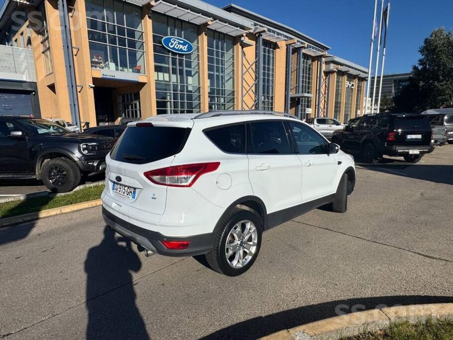 White Ford Kuga 2014 in Riga, with an engine capacity of 2.00 L and mileage of 206 thousand km for 7990 €, photo 4 on AUTOMOTO.COM.LV