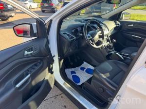White Ford Kuga 2014 in Riga, with an engine capacity of 2.00 L and mileage of 206 thousand km for 7990 €, photo 9 on AUTOMOTO.COM.LV