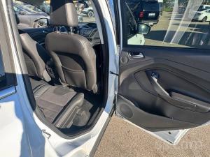 White Ford Kuga 2014 in Riga, with an engine capacity of 2.00 L and mileage of 206 thousand km for 7990 €, photo 11 on AUTOMOTO.COM.LV