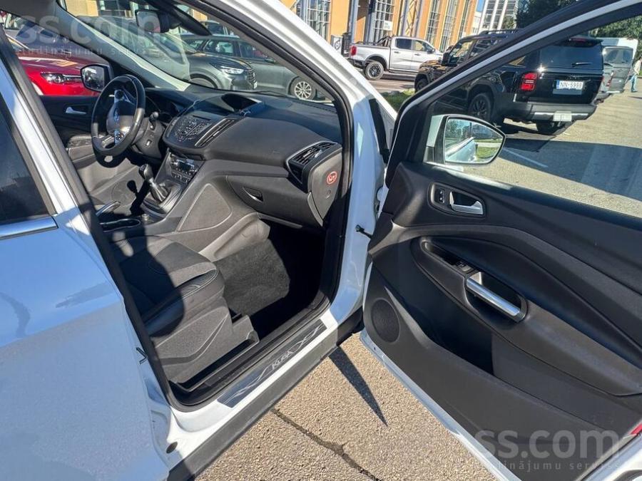 White Ford Kuga 2014 in Riga, with an engine capacity of 2.00 L and mileage of 206 thousand km for 7990 €, photo 12 on AUTOMOTO.COM.LV