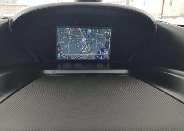 White Ford Kuga 2015 in Siauliai, with an engine capacity of 2.00 L and mileage of 274 thousand km for 6900 €, photo 11 on AUTOMOTO.COM.LV