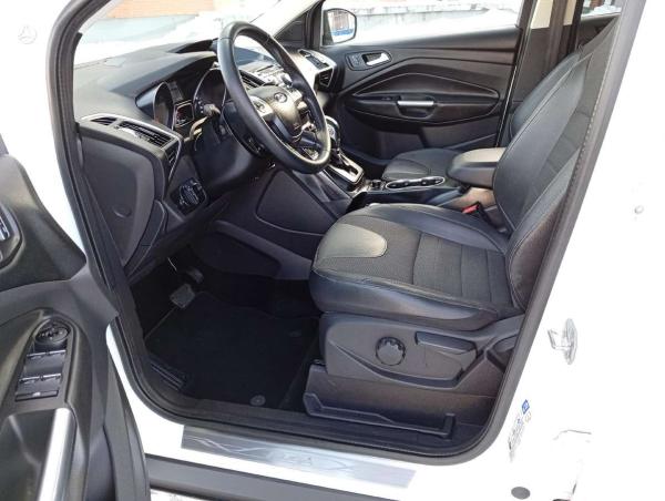 White Ford Kuga 2015 in Siauliai, with an engine capacity of 2.00 L and mileage of 240 thousand km for 7750 €, photo 9 on AUTOMOTO.COM.LV