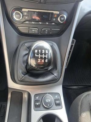 White Ford Kuga 2015 in Marijampole, with an engine capacity of 2.00 L and mileage of 329 thousand km for 5900 €, photo 13 on AUTOMOTO.COM.LV