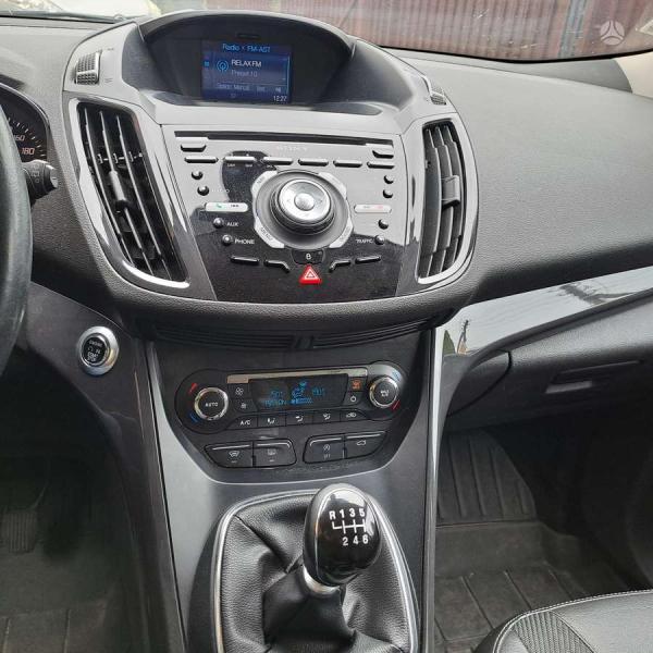White Ford Kuga 2015 in Radviliskis, with an engine capacity of 2.00 L and mileage of 315 thousand km for 9400 €, photo 5 on AUTOMOTO.COM.LV