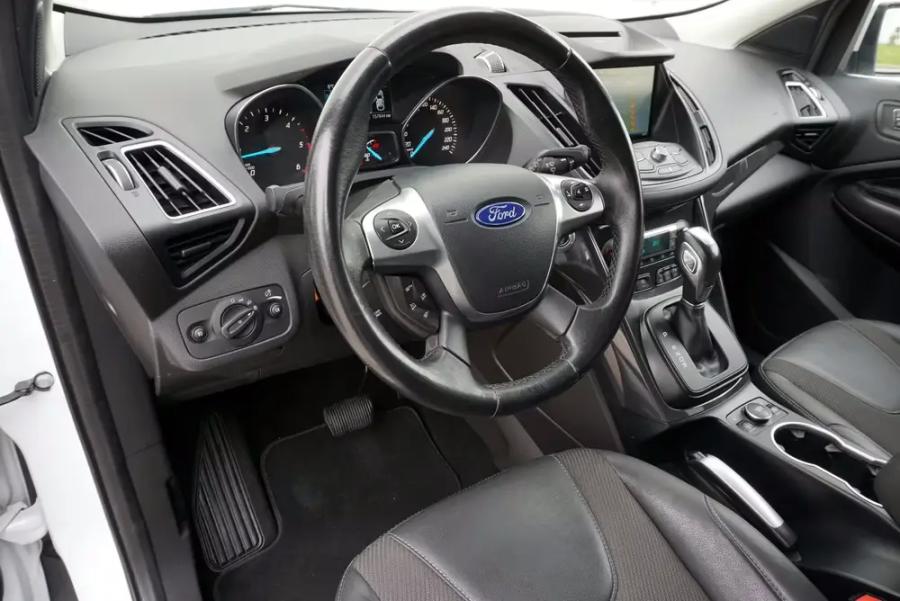 White Ford Kuga 2016 in Riga, with an engine capacity of 2.00 L and mileage of 158 thousand km for 7600 €, photo 23 on AUTOMOTO.COM.LV