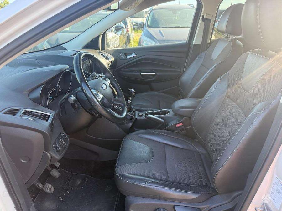 White Ford Kuga 2016 in Siauliai, with an engine capacity of 2.00 L and mileage of 270 thousand km for 6700 €, photo 14 on AUTOMOTO.COM.LV