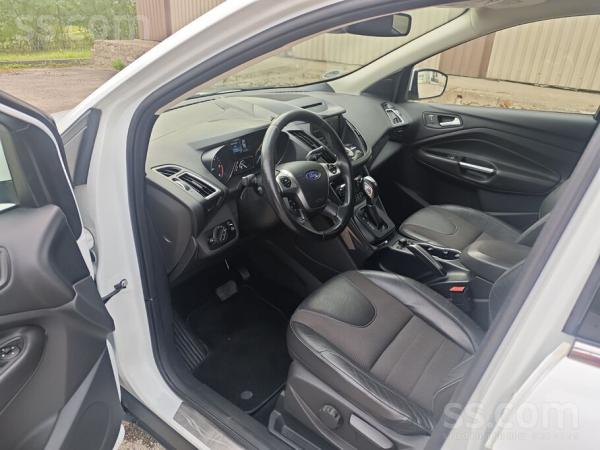 White Ford Kuga 2016 in Jekabpils, with an engine capacity of 2.00 L and mileage of 206 thousand km for 9100 €, photo 8 on AUTOMOTO.COM.LV