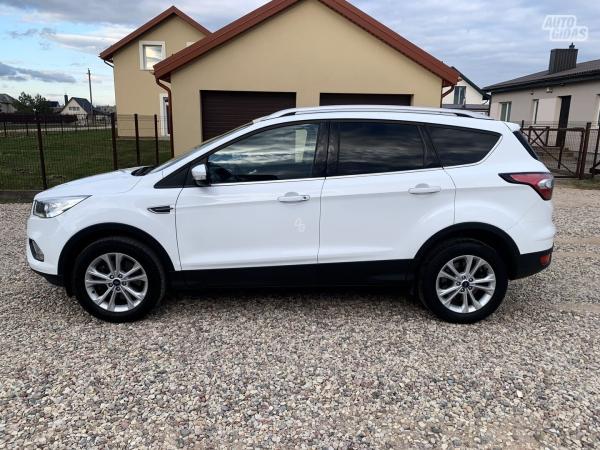 White Ford Kuga 2017 in Vilnius, with an engine capacity of 1.50 L and mileage of 192 thousand km for 9850 €, photo 2 on AUTOMOTO.COM.LV