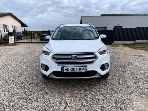 White Ford Kuga 2017 in Vilnius, with an engine capacity of 1.50 L and mileage of 192 thousand km for 9850 €, photo 4 on AUTOMOTO.COM.LV