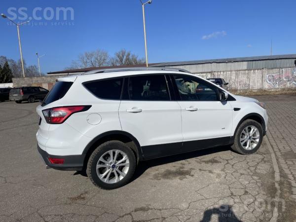 White Ford Kuga 2017 in Riga, with an engine capacity of 2.00 L and mileage of 0 thousand km for 9300 €, photo 5 on AUTOMOTO.COM.LV