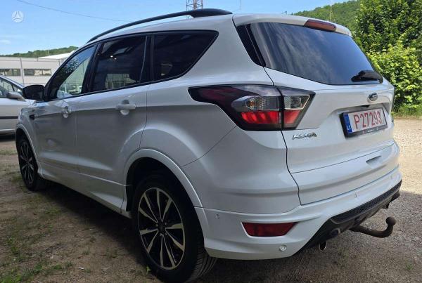 White Ford Kuga 2017 in Kaunas, with an engine capacity of 1.50 L and mileage of 213 thousand km for 9250 €, photo 6 on AUTOMOTO.COM.LV