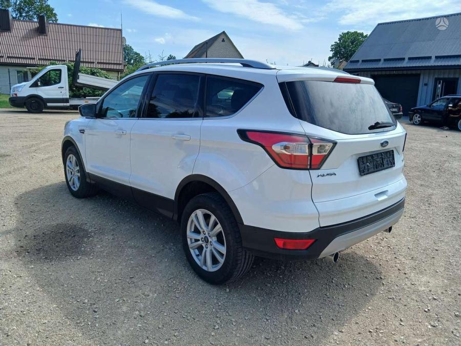 White Ford Kuga 2017 in Kelme, with an engine capacity of 1.50 L and mileage of 159 thousand km for 7200 €, photo 6 on AUTOMOTO.COM.LV