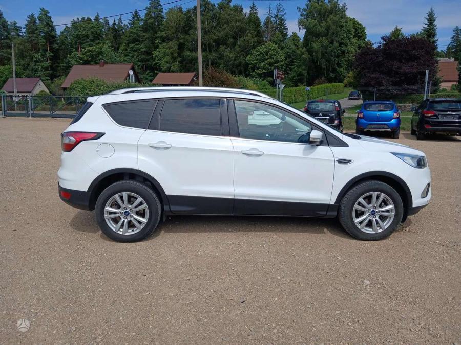 White Ford Kuga 2017 in Kelme, with an engine capacity of 1.50 L and mileage of 159 thousand km for 7200 €, photo 9 on AUTOMOTO.COM.LV