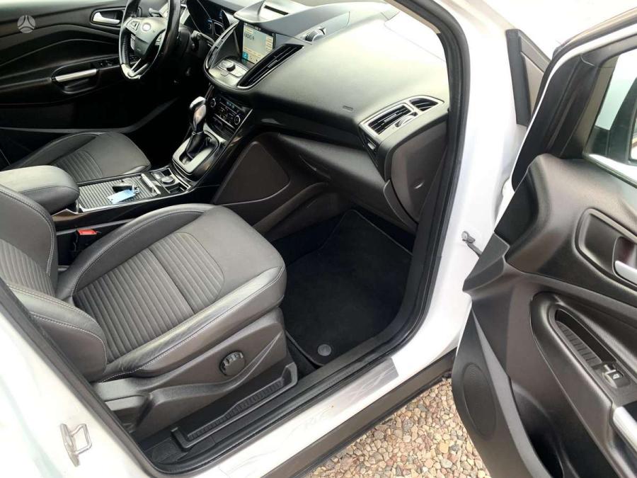 White Ford Kuga 2017 in Vilnius, with an engine capacity of 1.50 L and mileage of 192 thousand km for 8450 €, photo 12 on AUTOMOTO.COM.LV