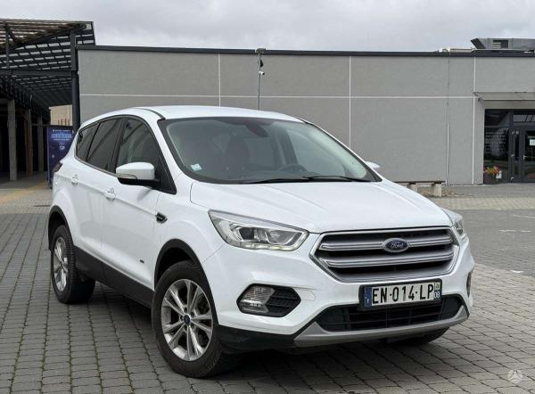 White Ford Kuga 2017 in Raseiniai, with an engine capacity of 2.00 L and mileage of 300 thousand km for 6499 €, photo 1 on AUTOMOTO.COM.LV