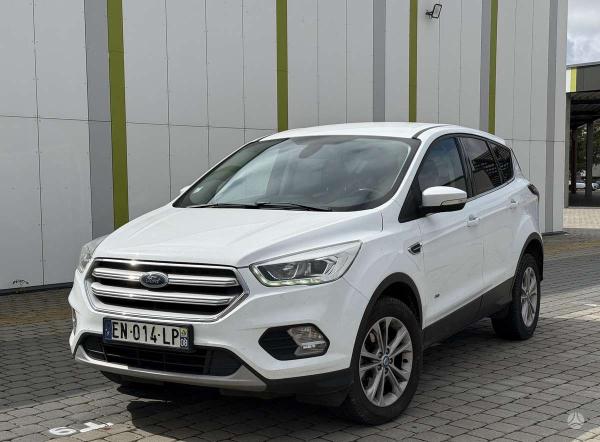 White Ford Kuga 2017 in Raseiniai, with an engine capacity of 2.00 L and mileage of 300 thousand km for 6499 €, photo 4 on AUTOMOTO.COM.LV