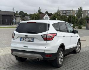 White Ford Kuga 2017 in Raseiniai, with an engine capacity of 2.00 L and mileage of 300 thousand km for 6499 €, photo 5 on AUTOMOTO.COM.LV
