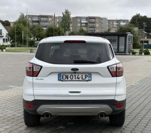 White Ford Kuga 2017 in Raseiniai, with an engine capacity of 2.00 L and mileage of 300 thousand km for 6499 €, photo 6 on AUTOMOTO.COM.LV