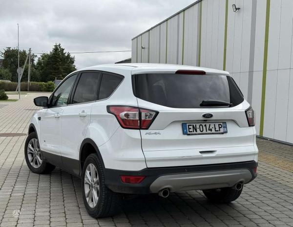 White Ford Kuga 2017 in Raseiniai, with an engine capacity of 2.00 L and mileage of 300 thousand km for 6499 €, photo 7 on AUTOMOTO.COM.LV
