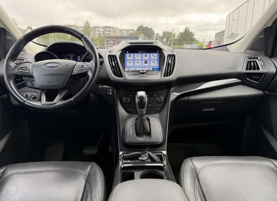 White Ford Kuga 2017 in Raseiniai, with an engine capacity of 2.00 L and mileage of 300 thousand km for 6499 €, photo 17 on AUTOMOTO.COM.LV